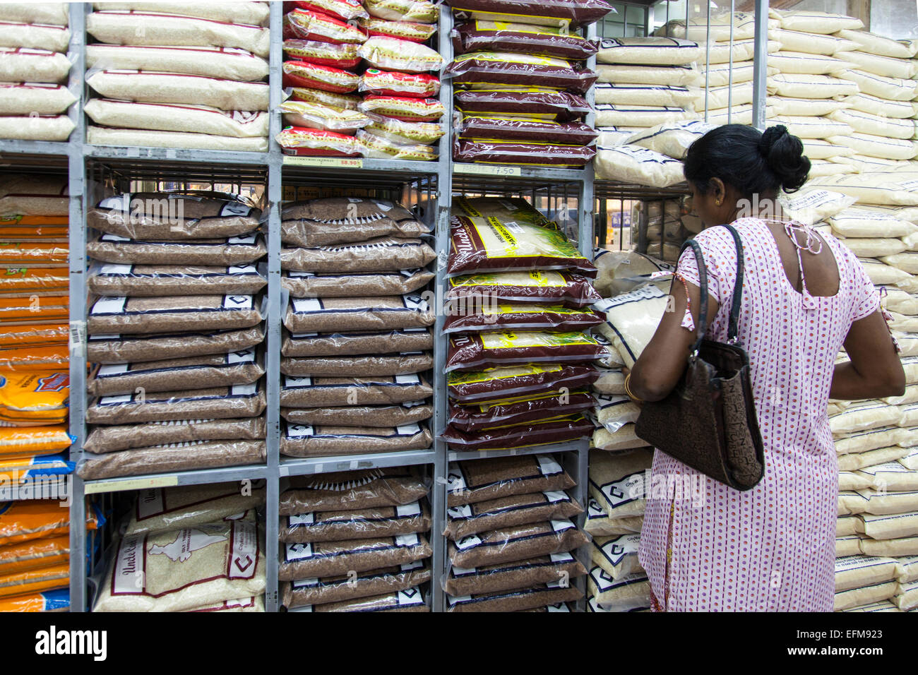 a woman shopping for rice in a supermarket aisle, Singapore Stock Photo ...