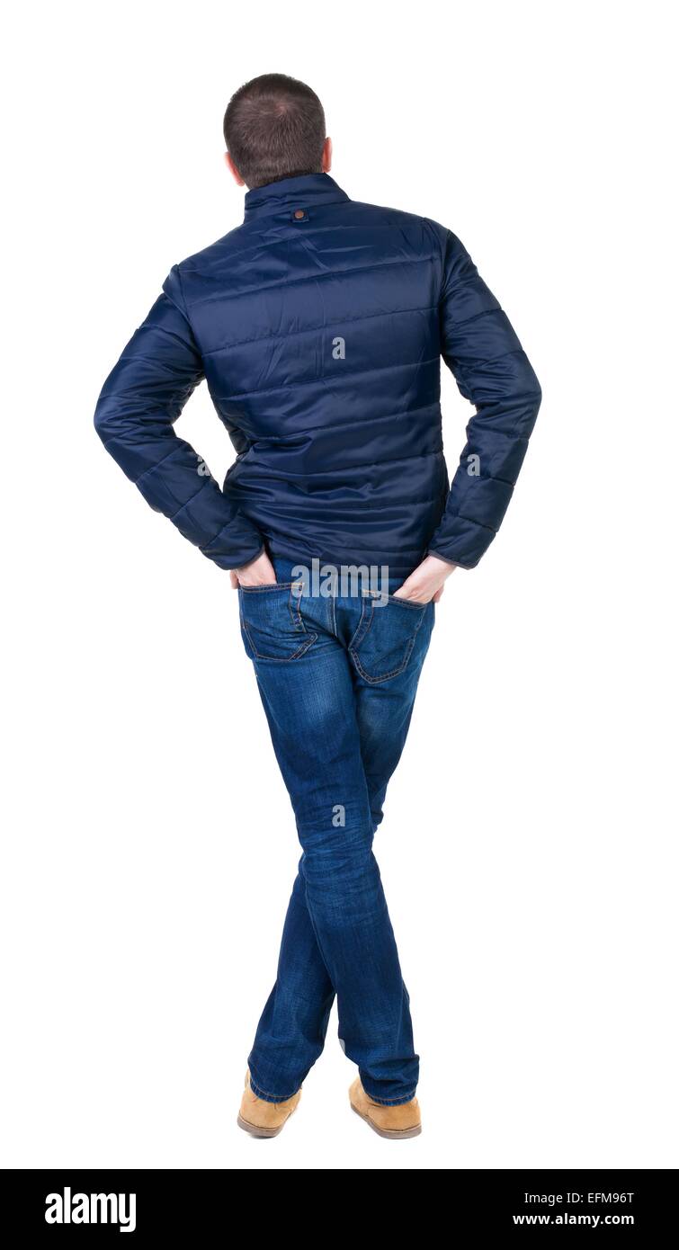 Back view of handsome man in blue windcheater looking. Standing young ...