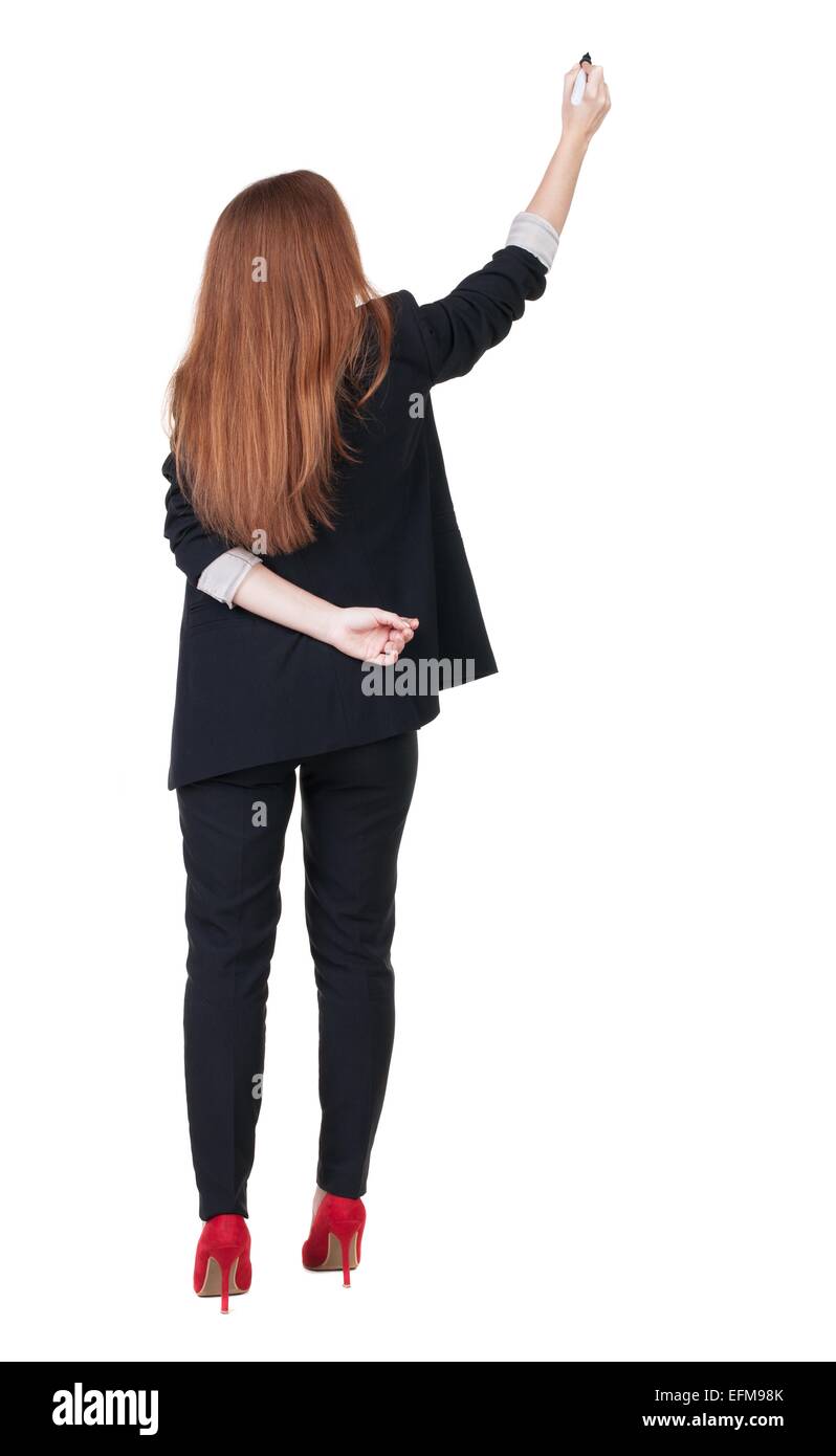 back view of writing beautiful redhead business woman. Young girl in ...