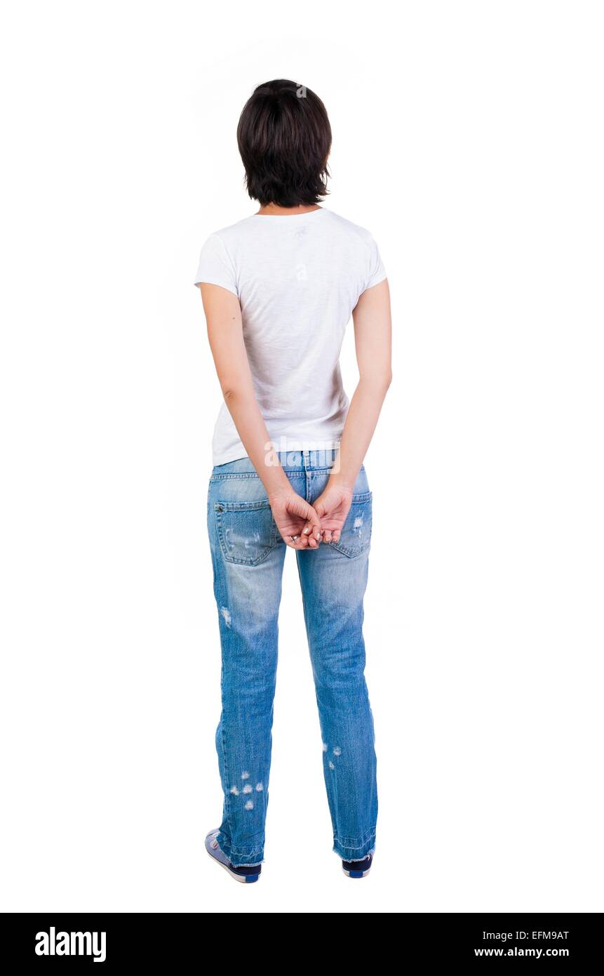 back view of standing young beautiful brunette woman. girl watching ...