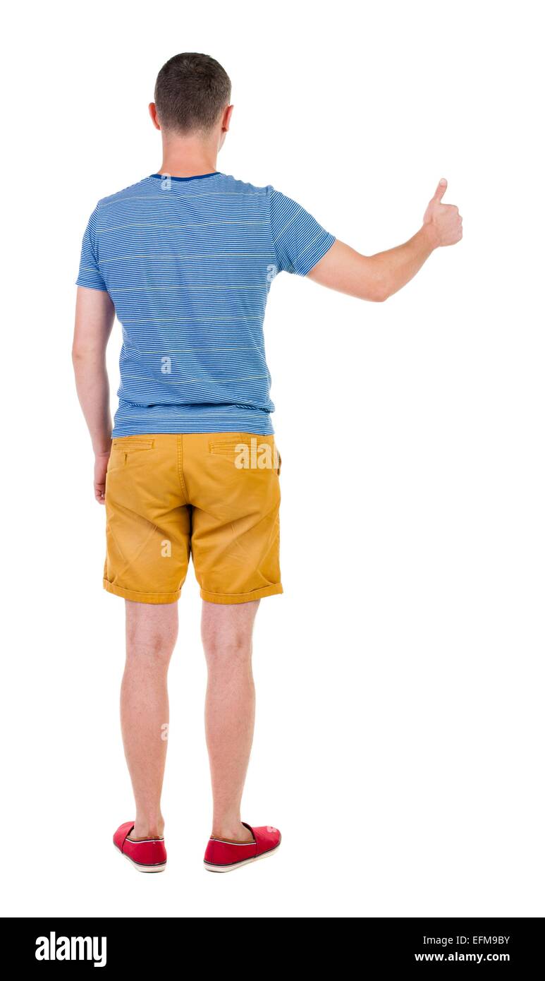 Back view of man in checkered shirt shows thumbs up. Rear view people ...