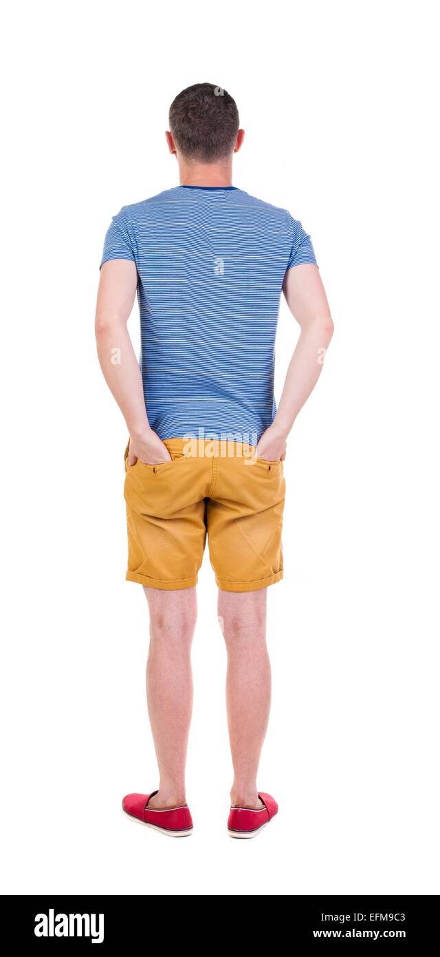 Back view of handsome man in shorts. Rear view people collection ...