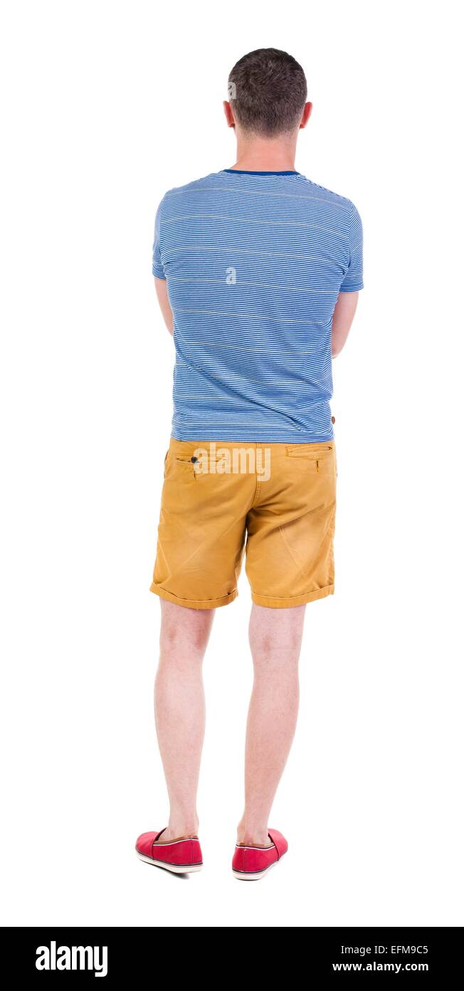 Back view of handsome man in shorts. Rear view people collection ...