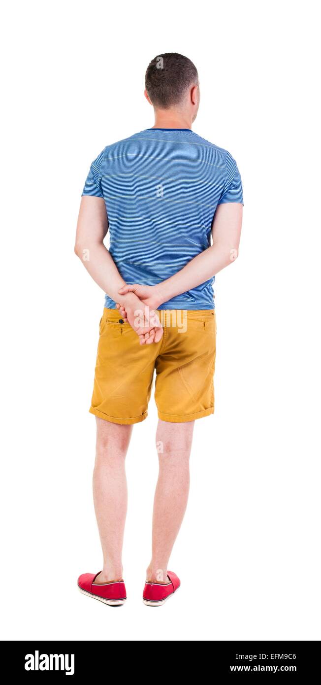 Back view of handsome man in shorts. Rear view people collection ...