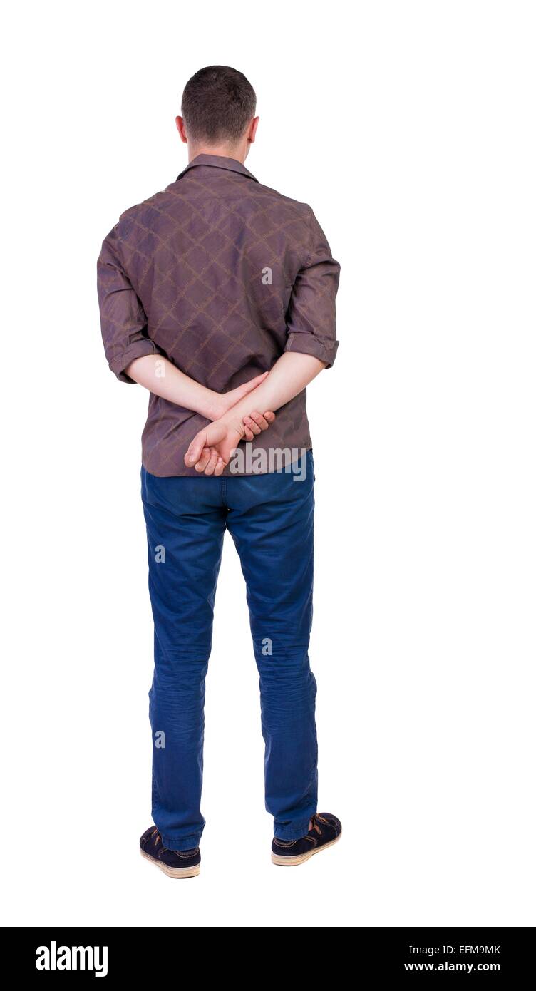 Back view of handsome man in shirt looking up. Standing young guy in ...