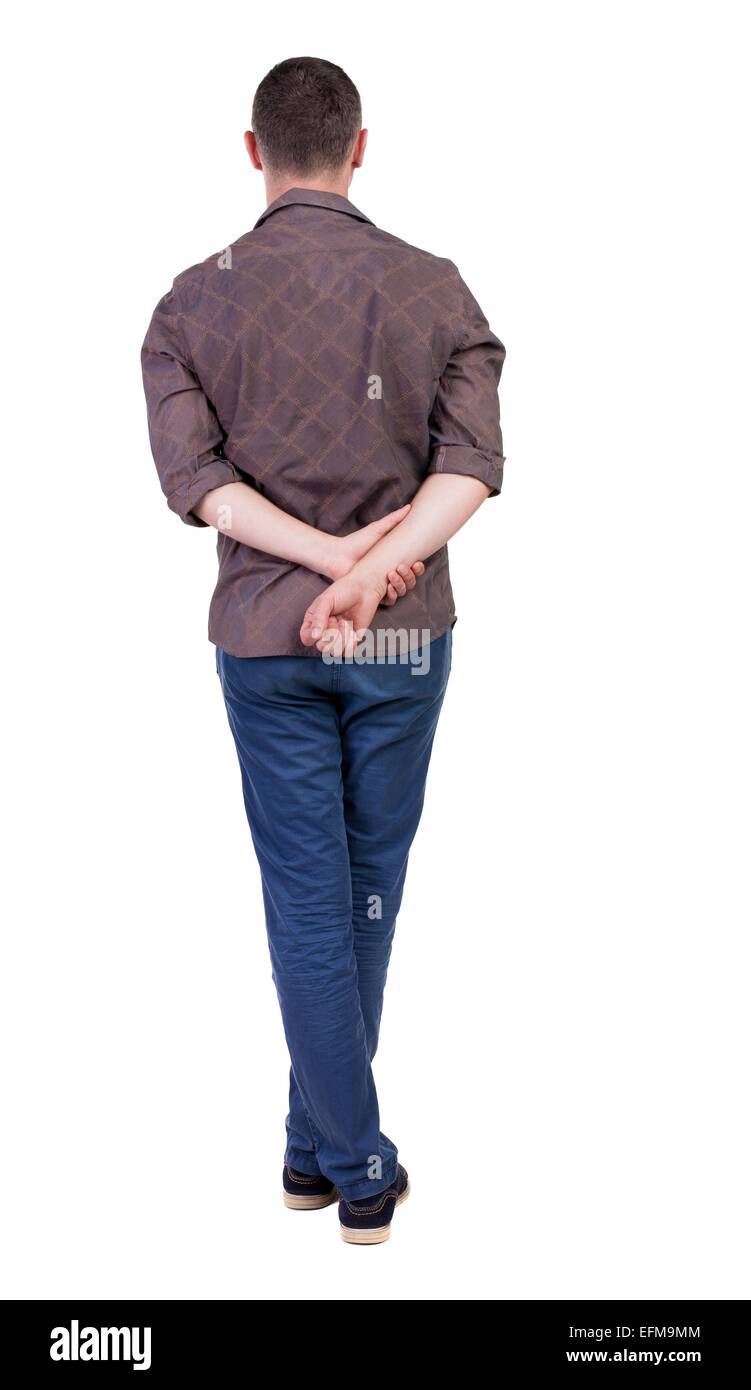 Back view of handsome man in shirt looking up. Standing young guy in ...