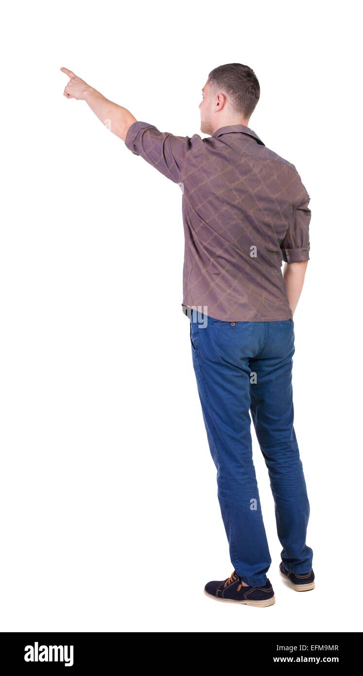 Back view of pointing young men in shirt and jeans. Young guy gesture ...