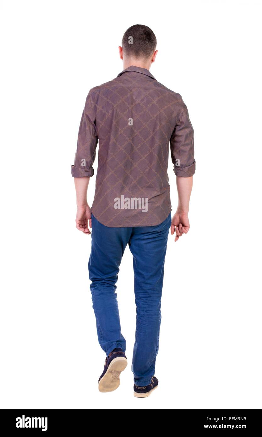 Back view of going handsome man in jeans and a shirt. walking young guy ...