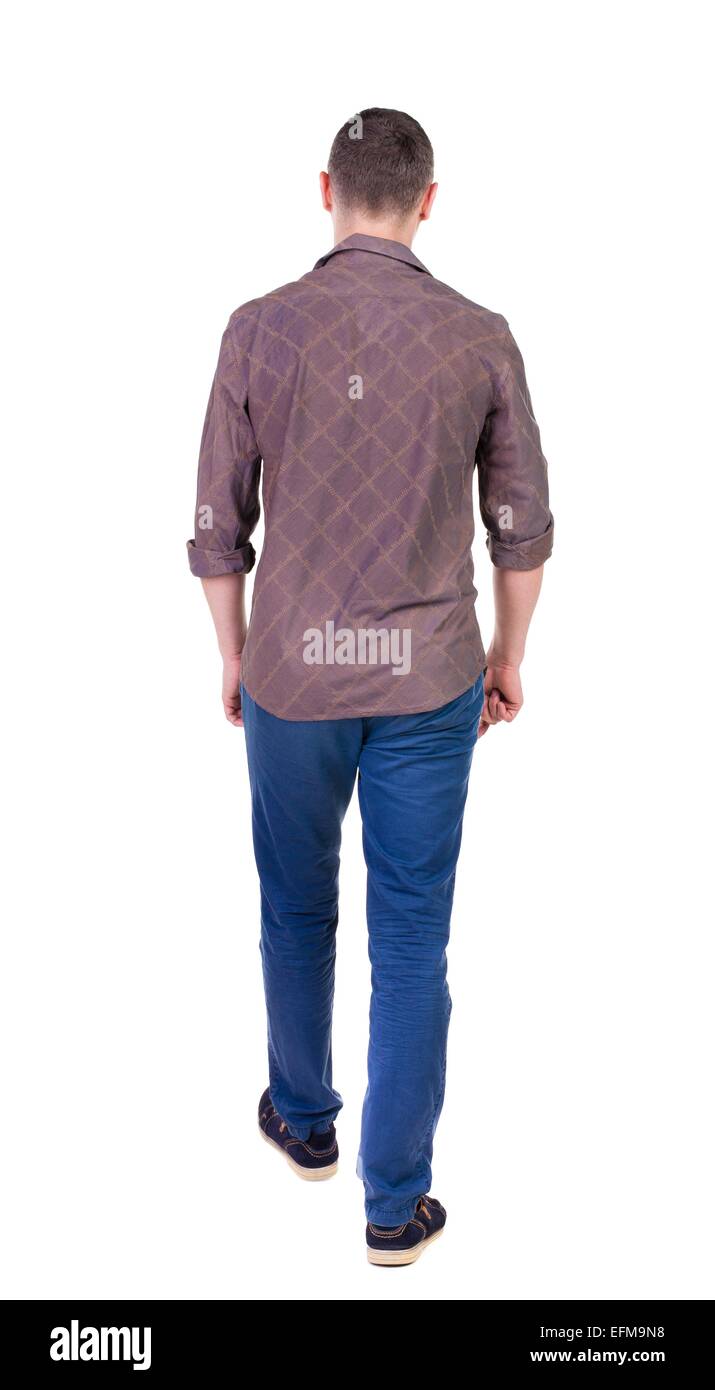 Back view of going handsome man in jeans and a shirt. walking young guy ...