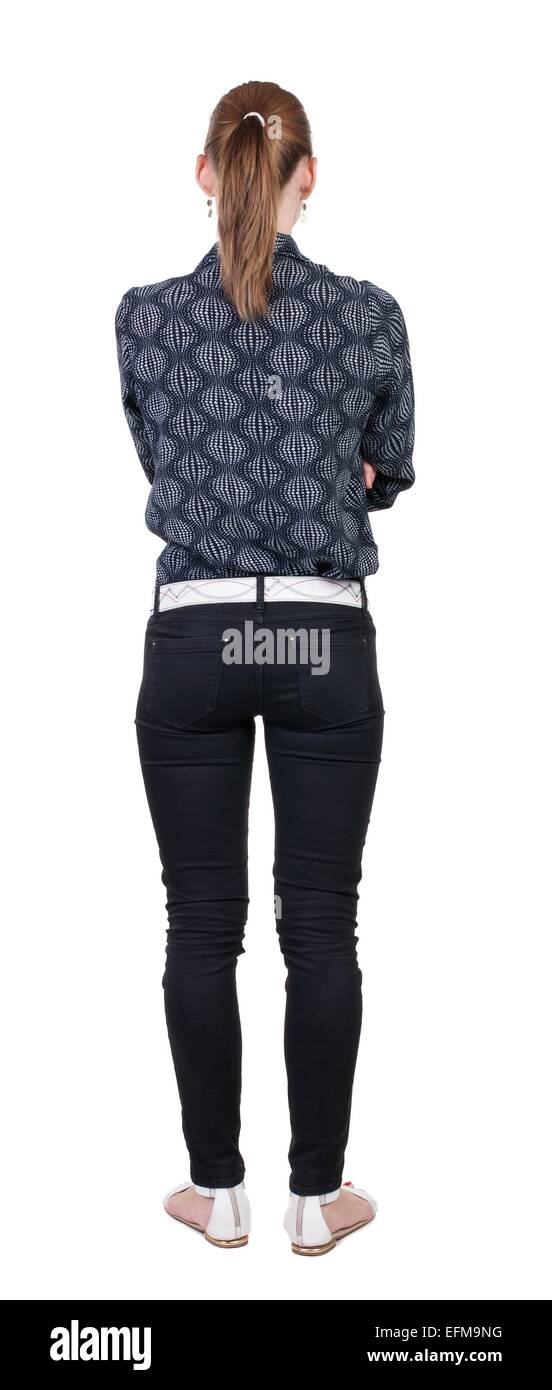 back view of standing young beautiful blonde woman in jeans. girl ...