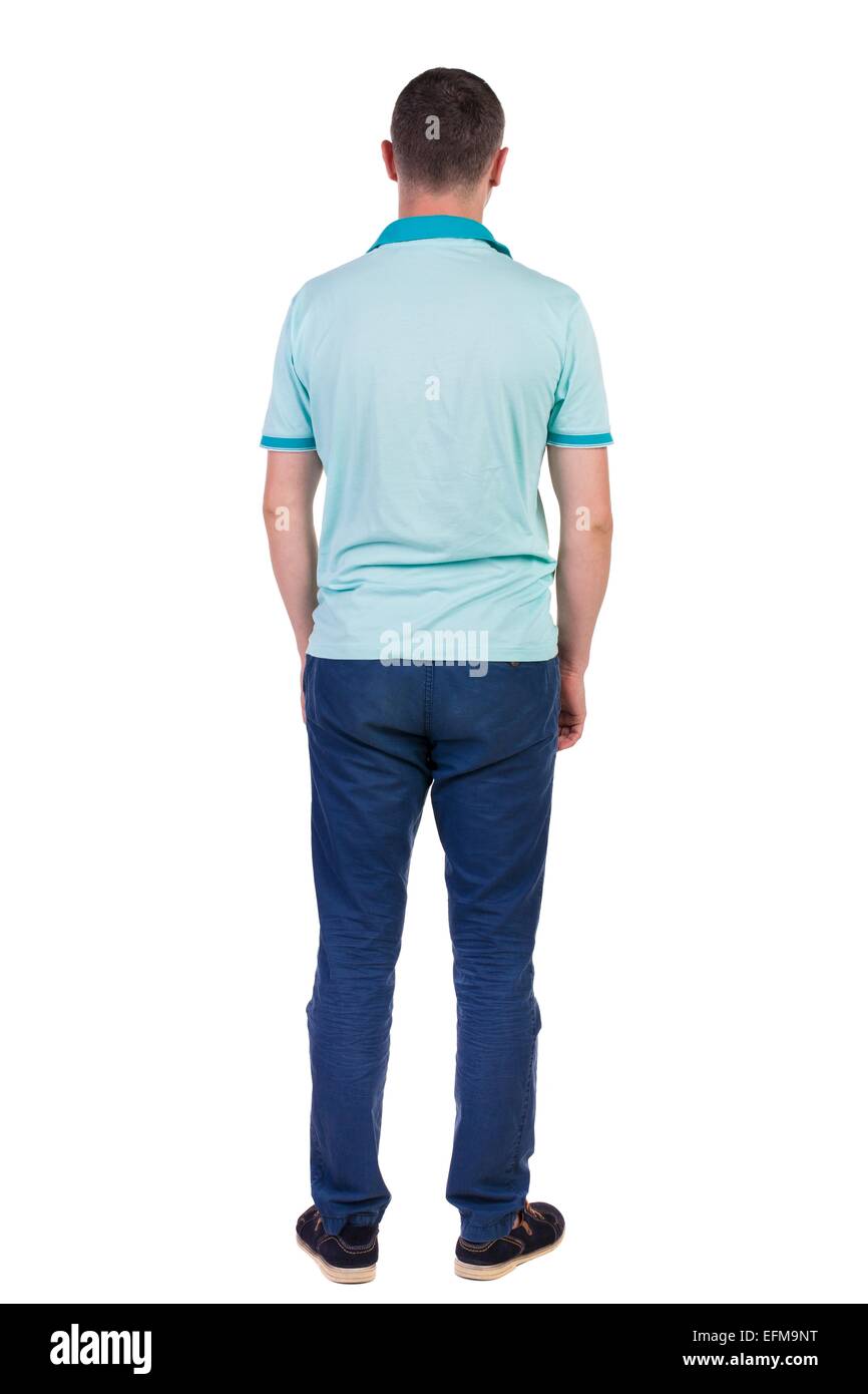 Back view of handsome man in polo looking up. Standing young guy in ...
