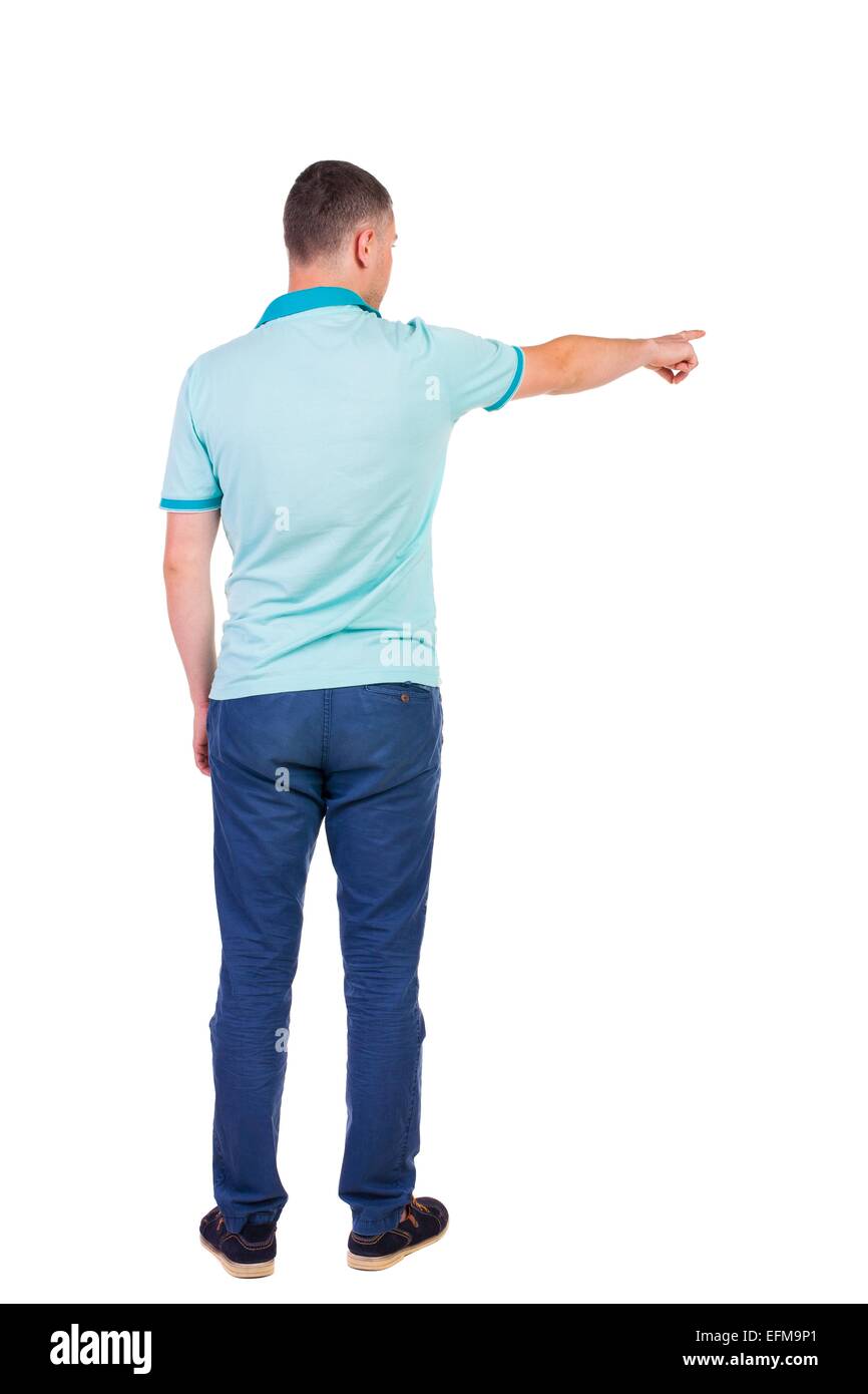 Back view of pointing young men in shirt and jeans. Young guy gesture ...