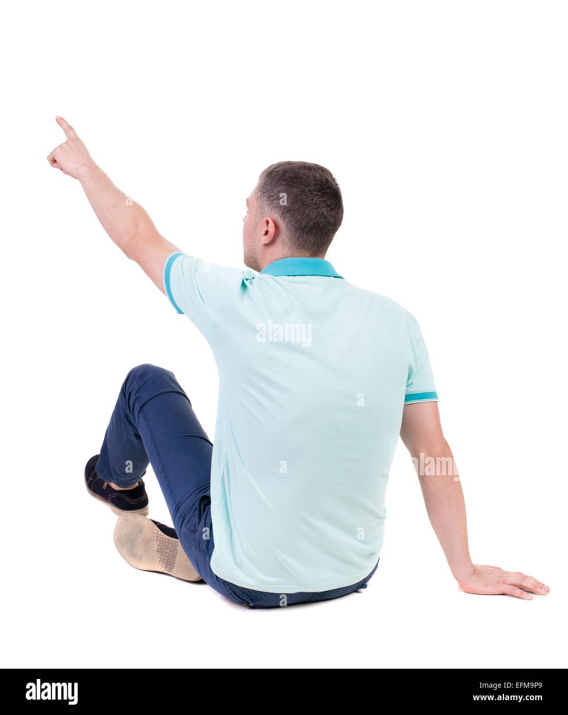 Back view of pointing young men in shirt and jeans. Young guy gesture ...