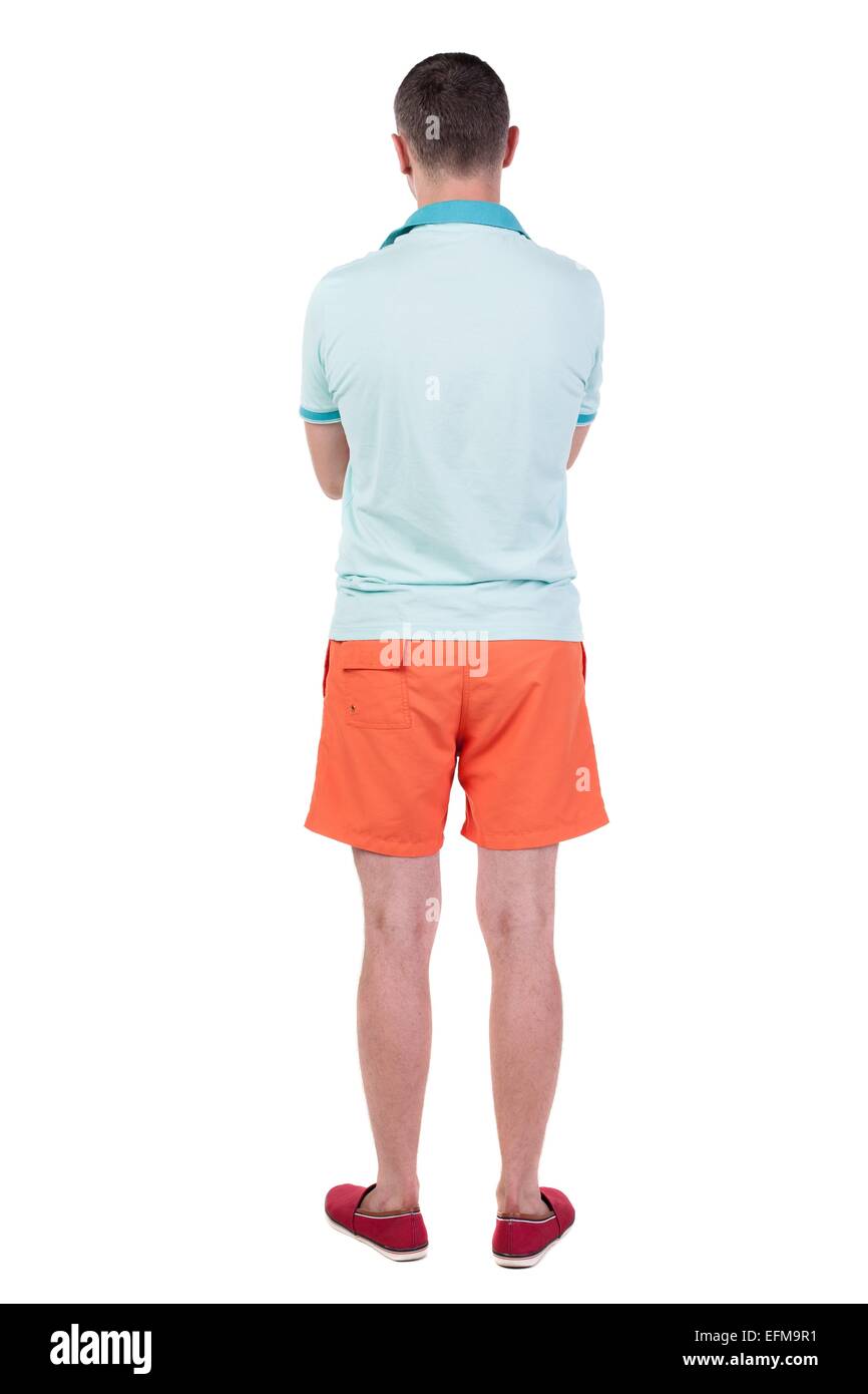 Back view of handsome man in shorts. Rear view people collection ...