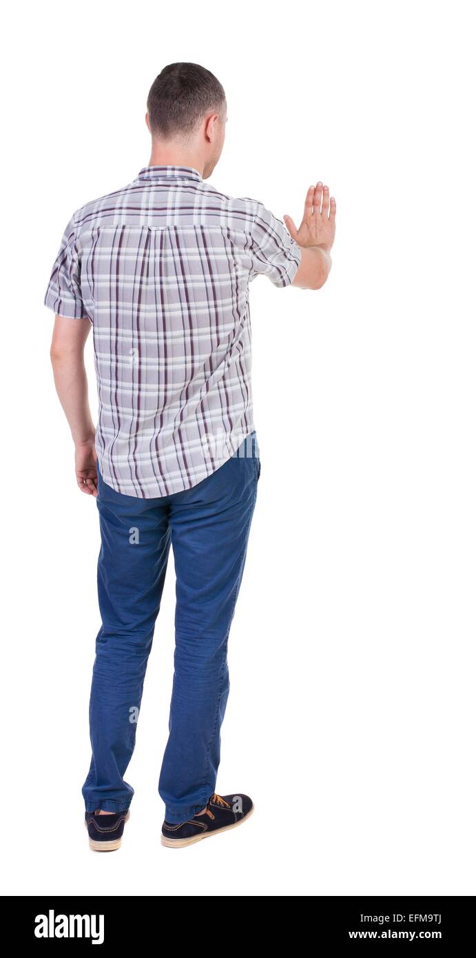 back view of man. Young man jeans presses down on something. Isolated ...