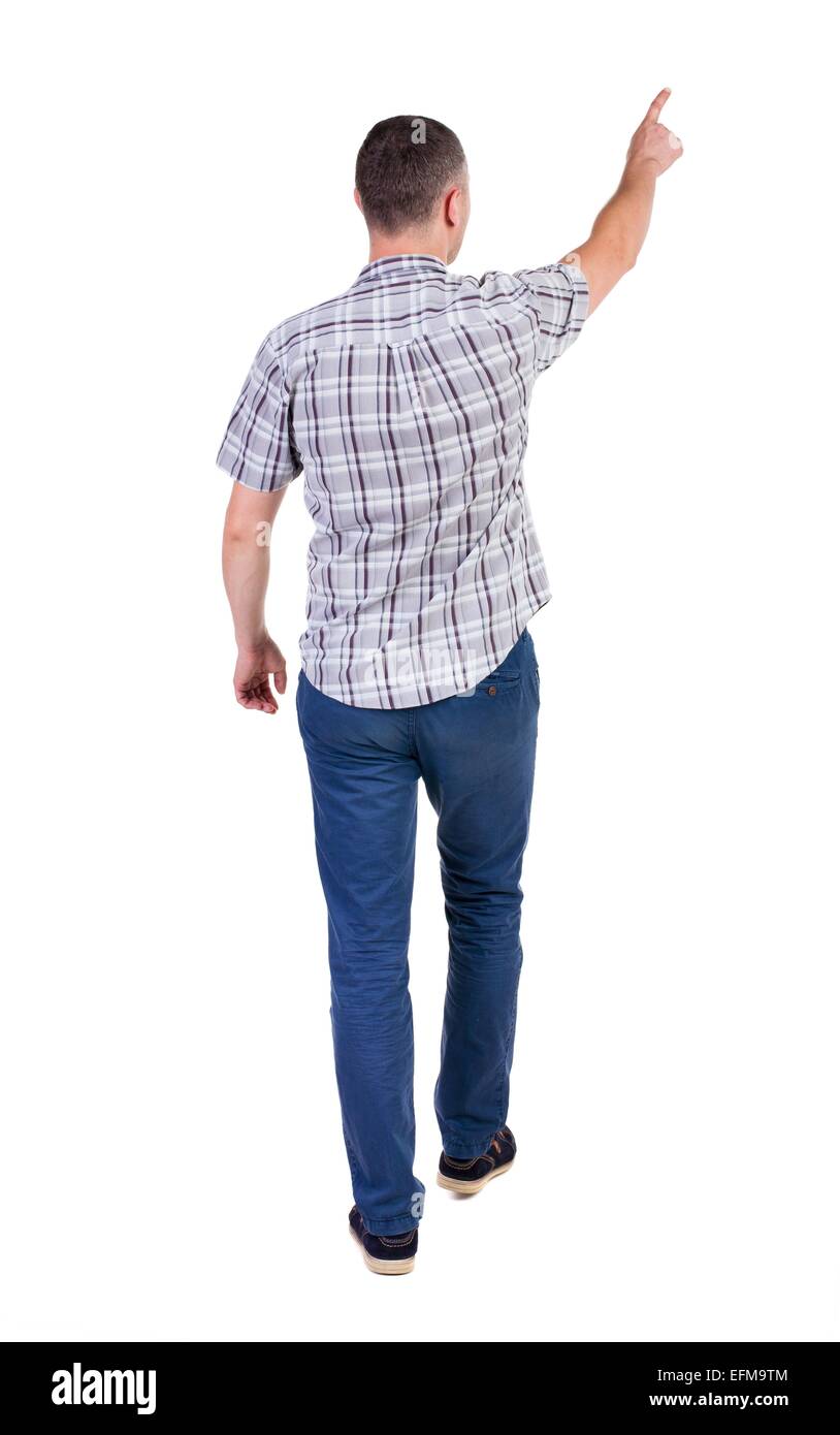 Back view of going handsome man in jeans and a shirt. walking young guy ...