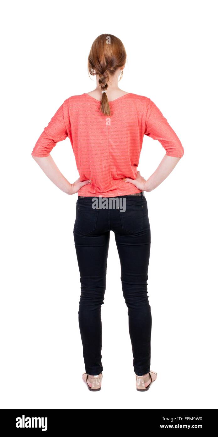 back view of standing young beautiful blonde woman in jeans. girl ...