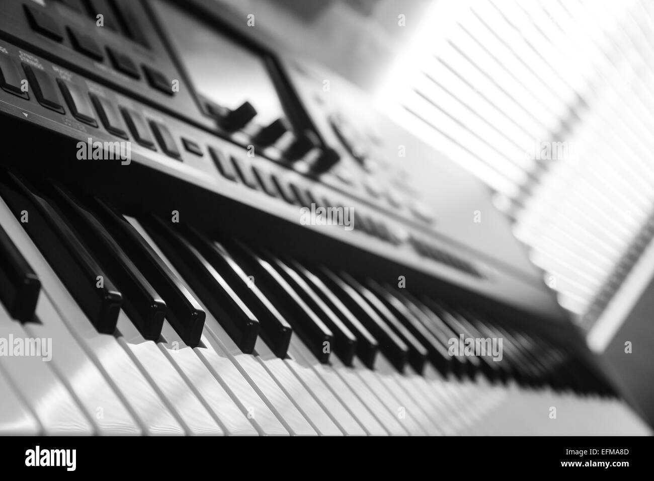 perspective down keyboard with blinds in background Stock Photo - Alamy