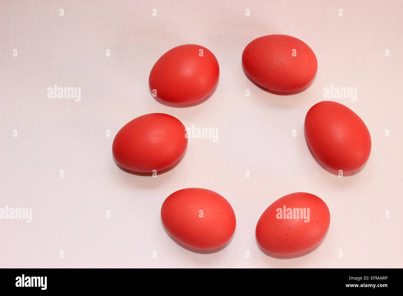 Red colored eggs for the easter holiday on white background Stock Photo ...