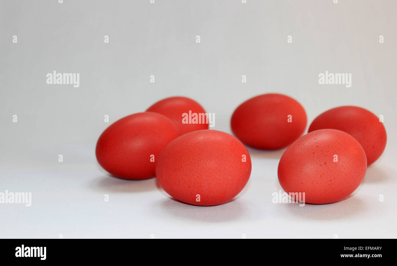 Red colored eggs for the easter holiday on white background Stock Photo ...
