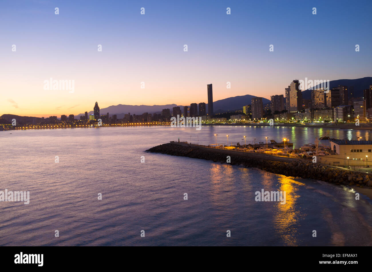 The skyline of Benidorm in the evening as seen from its harbor Stock ...