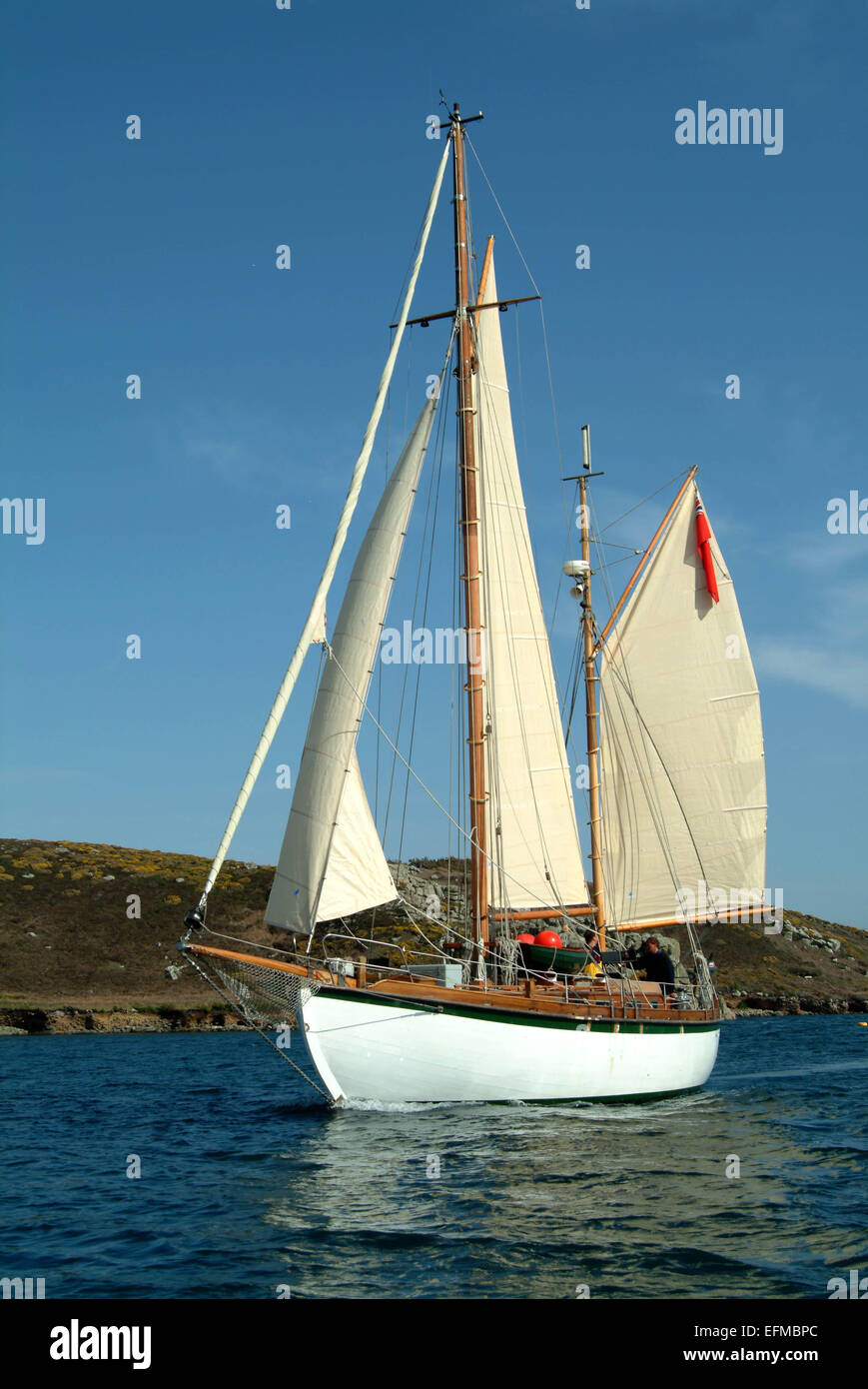 The vintage wooden ketch 'Orca' sailing off Tresco,Scilly Isles ...