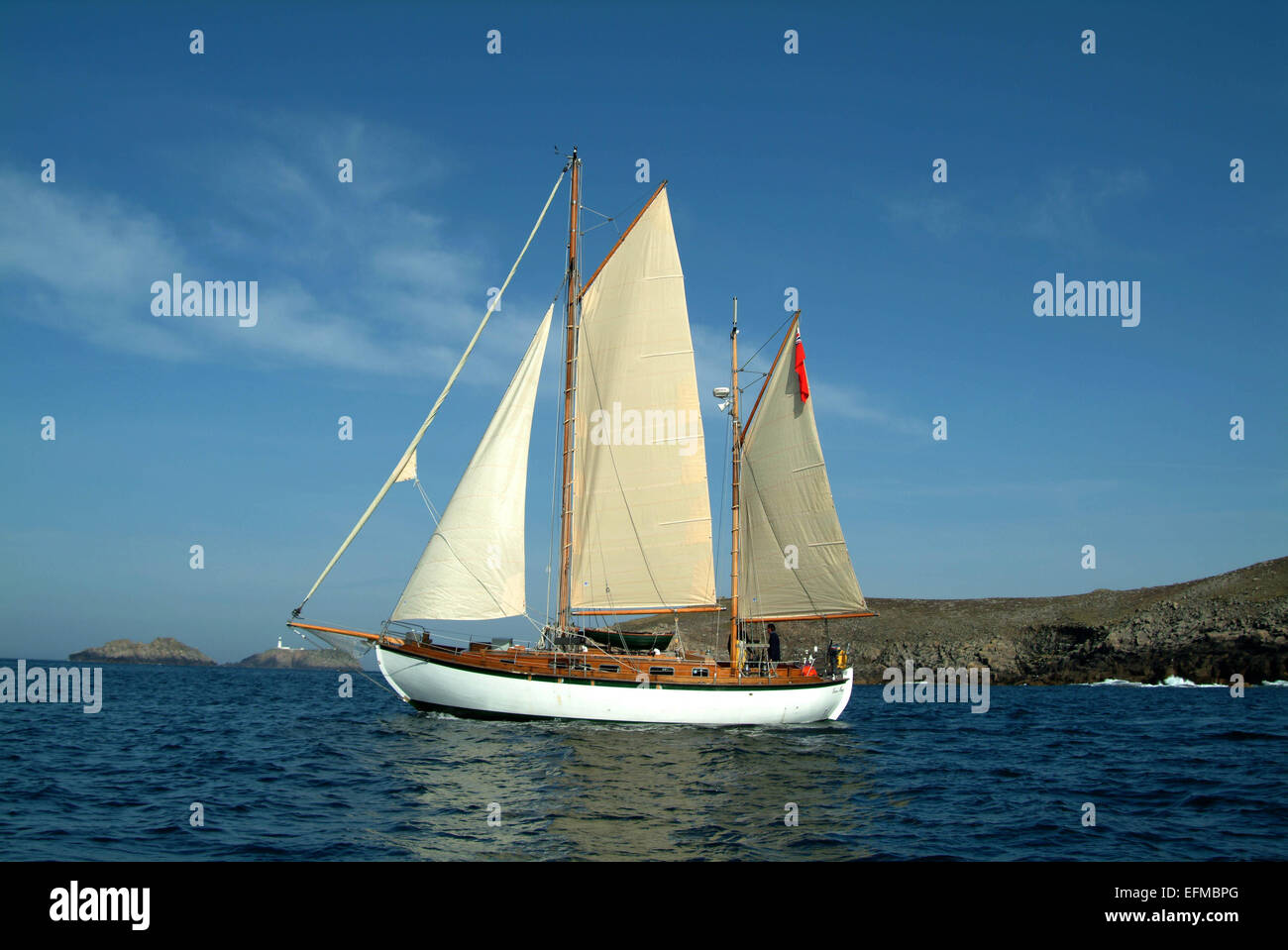 The vintage wooden ketch 'Orca' sailing off Tresco,Scilly Isles ...
