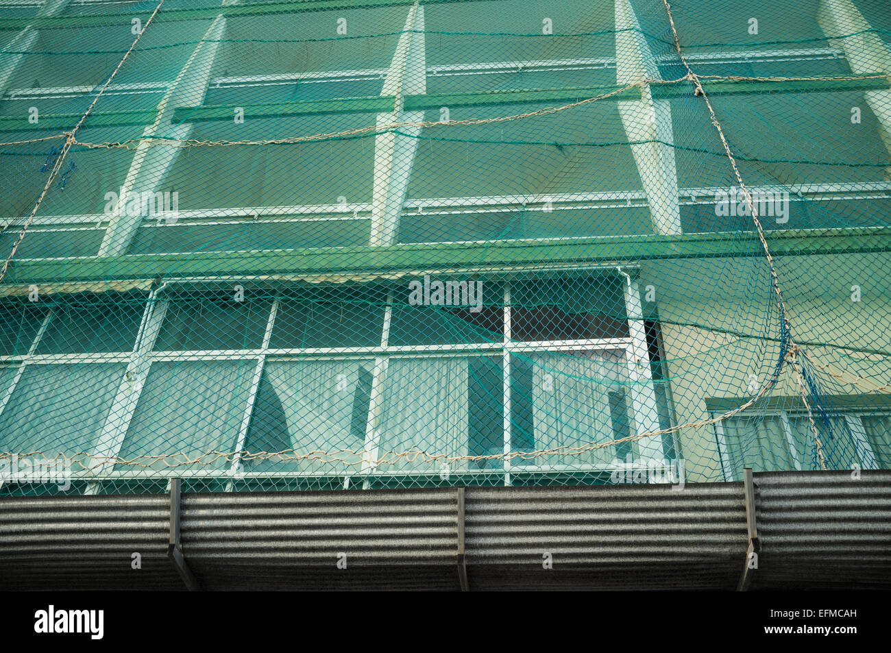 Safety netting on the facade of a building Stock Photo - Alamy
