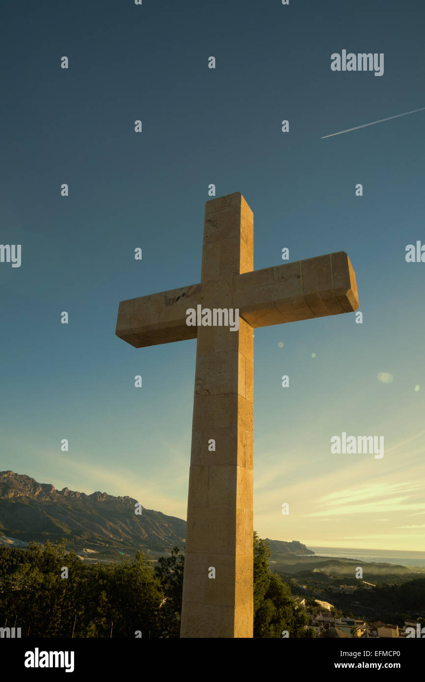 Tall Christian cross under a strong morning sun Stock Photo - Alamy