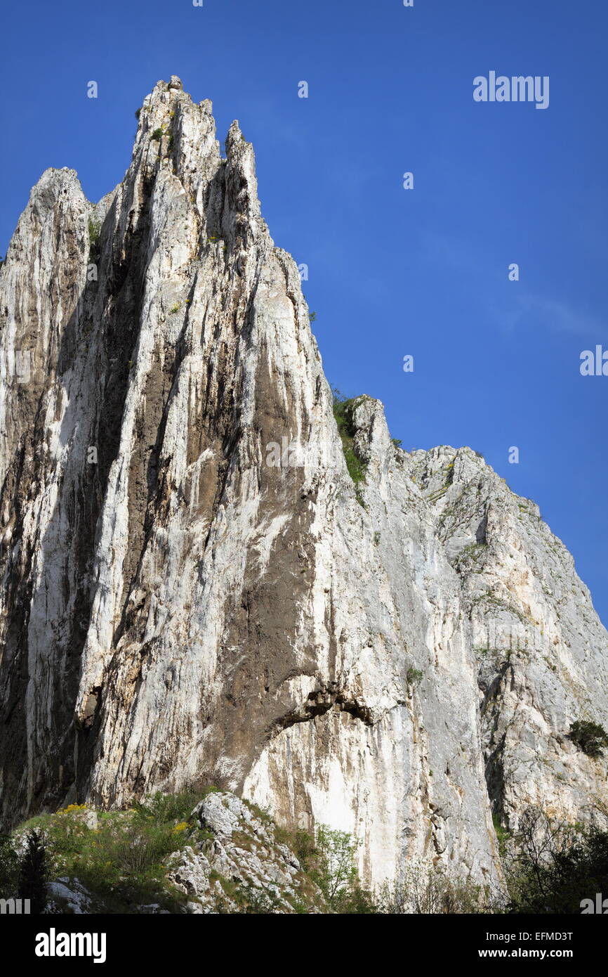 big limestone ridge over blue sky in Cheile Turzii, Romania Stock Photo ...