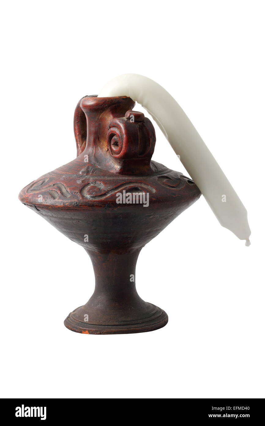 clay support with molten candle isolated over white background Stock ...