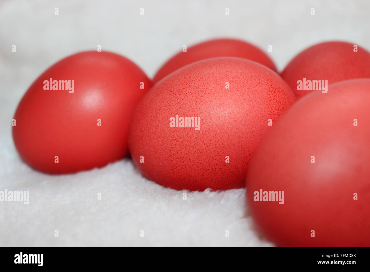 Red colored eggs for the easter holiday on white background Stock Photo ...