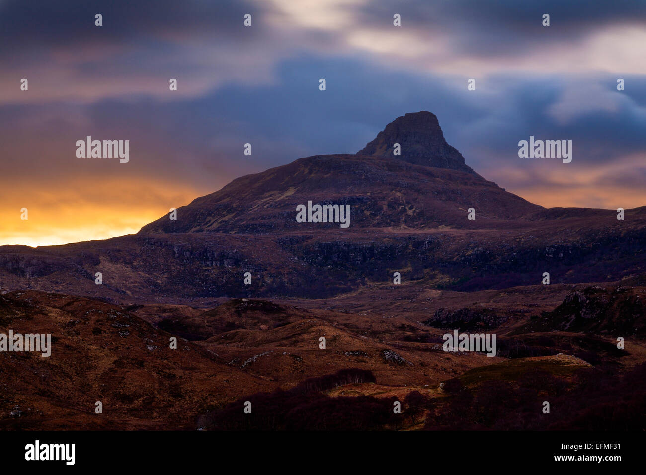 A spectacular sunrise behind Stac Pollaidh in Inverpolly Stock Photo ...