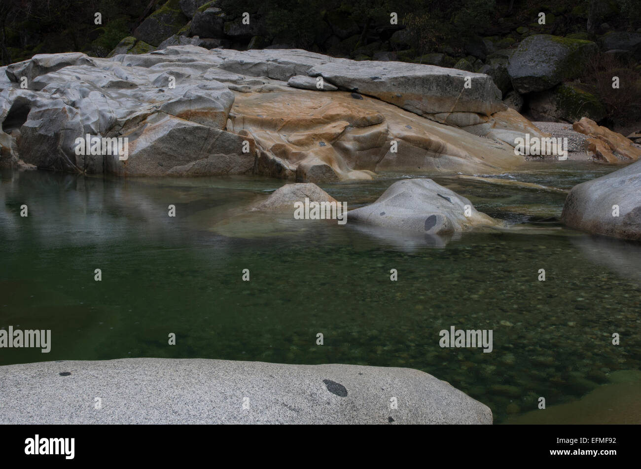 Stone meets flowing water Stock Photo - Alamy