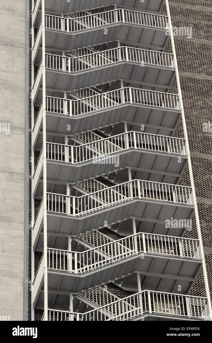 Detail of a tall buildings fire escape ladder Stock Photo - Alamy