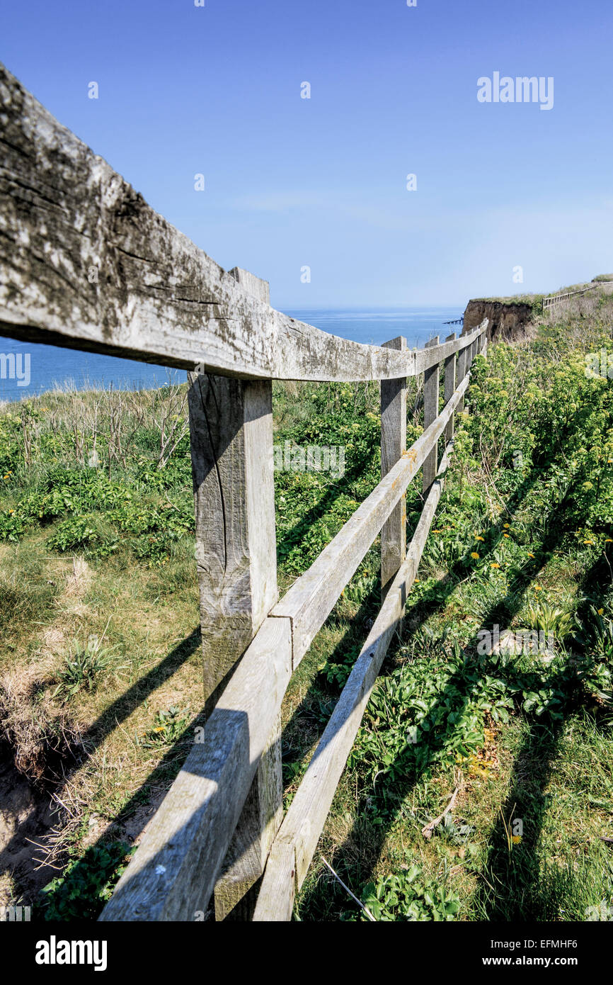 Fence on cliff edge Stock Photo - Alamy