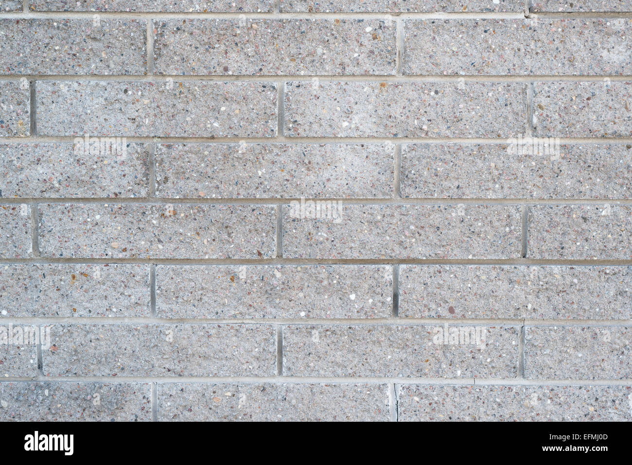 Concrete block wall as abstract background Stock Photo - Alamy