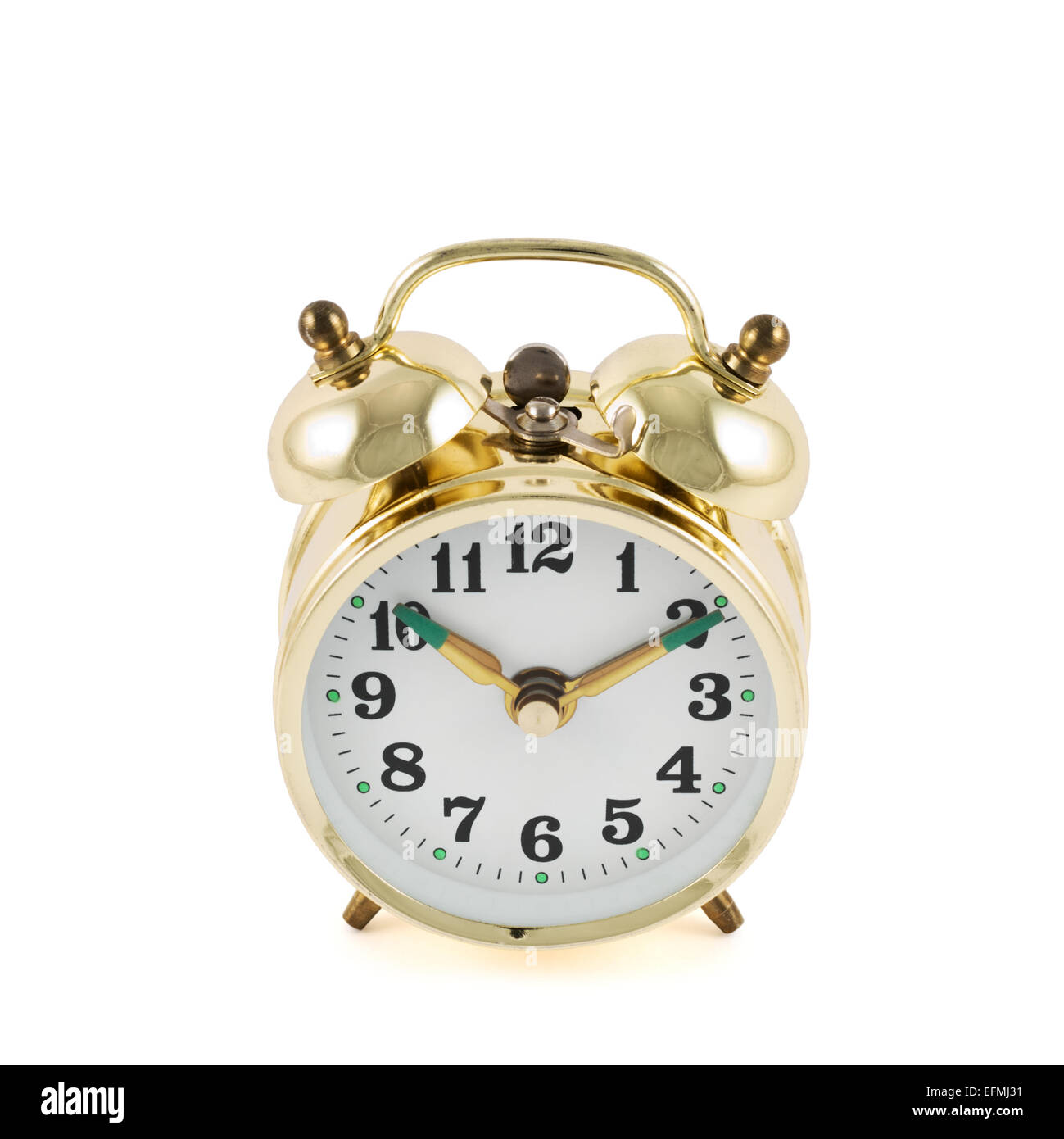 Golden mechanical alarm clock isolated Stock Photo - Alamy