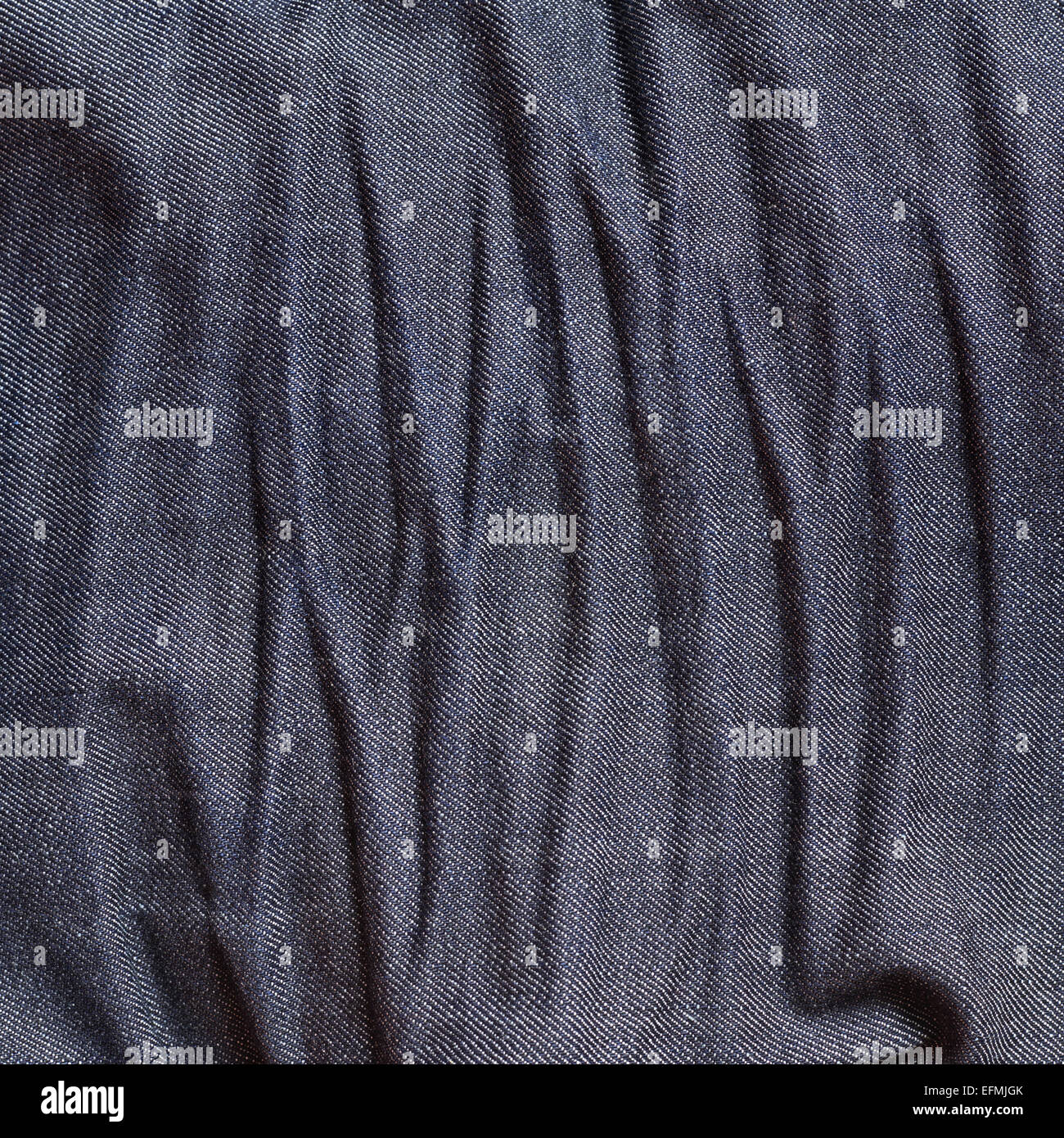 Crumpled jeans cloth texture Stock Photo - Alamy