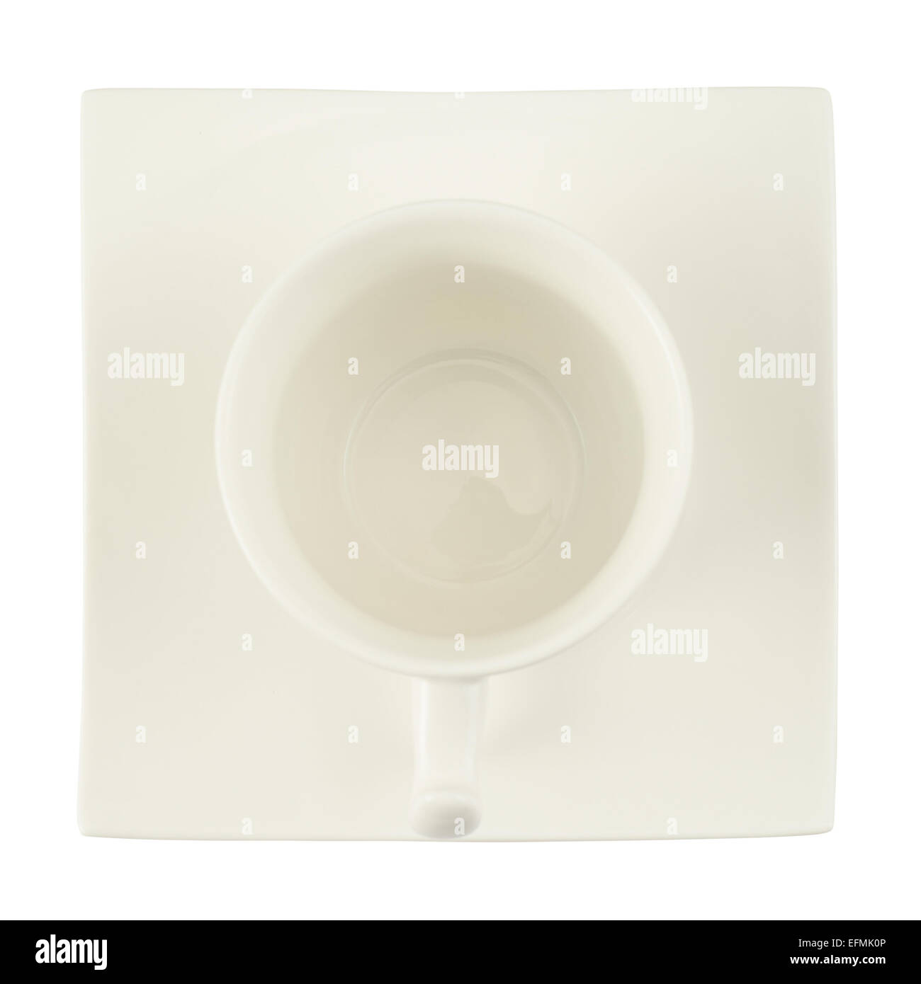 Tea cup over a square plate isolated Stock Photo - Alamy