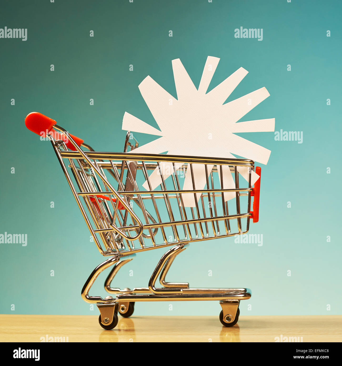 Sun shape inside shopping cart Stock Photo - Alamy