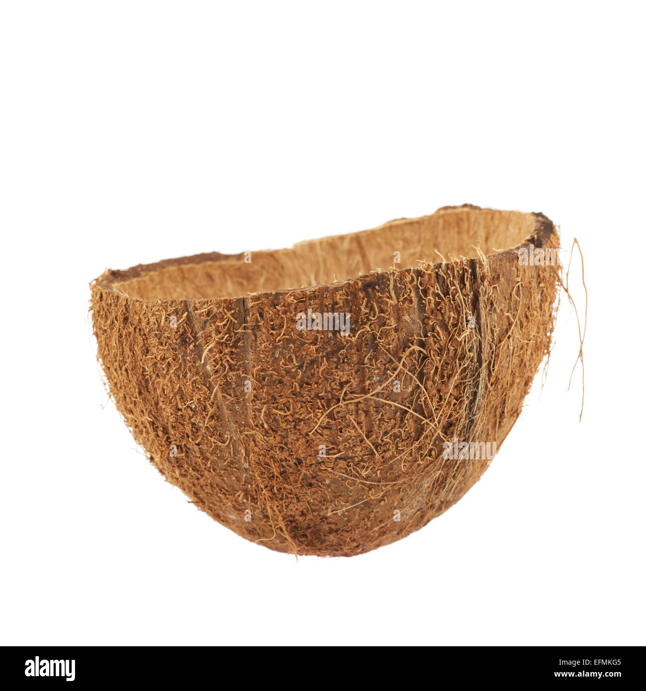 Coconut fruit shell cut in half Stock Photo - Alamy