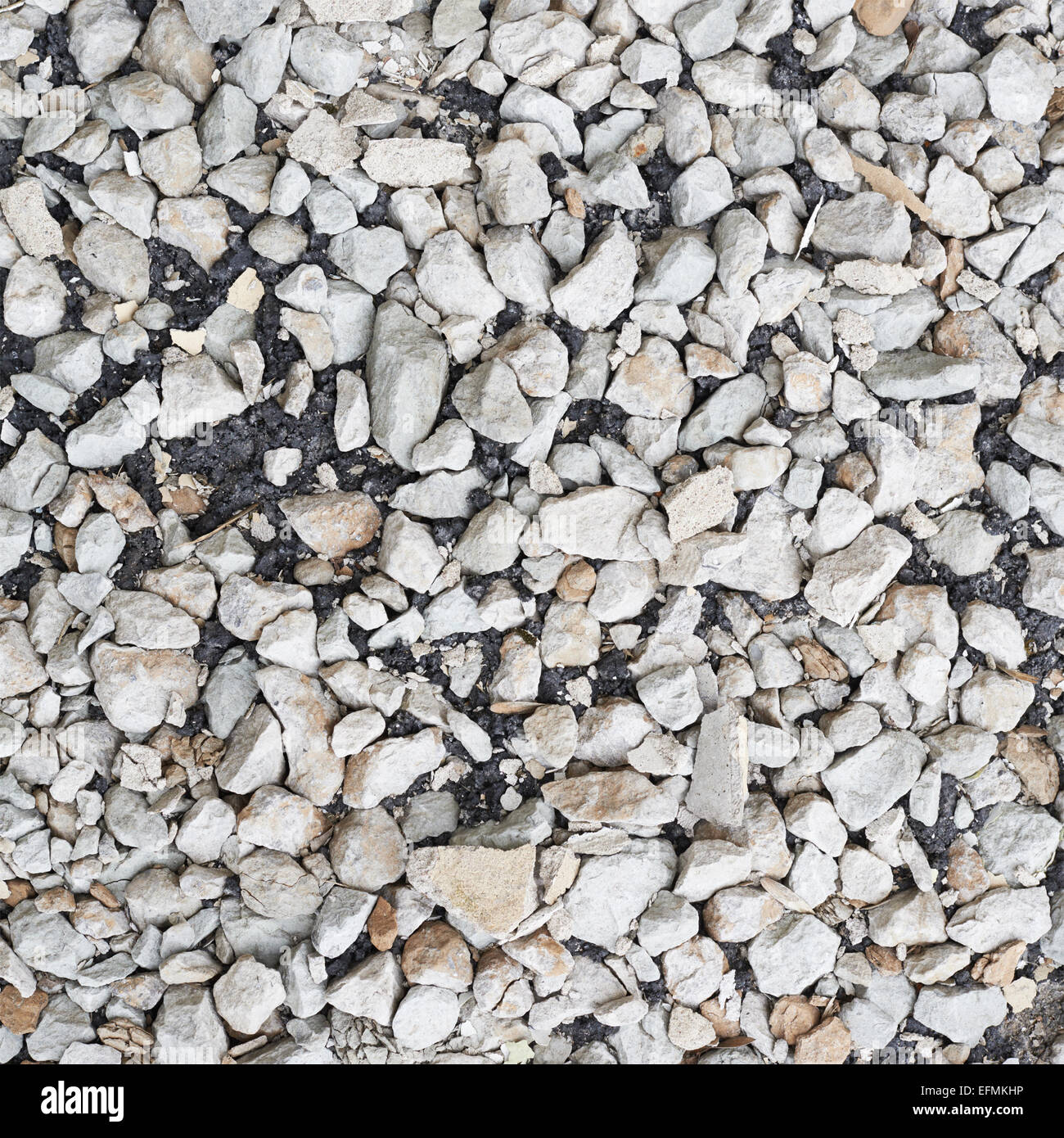 Stone pebbles mixed with asphalt Stock Photo - Alamy