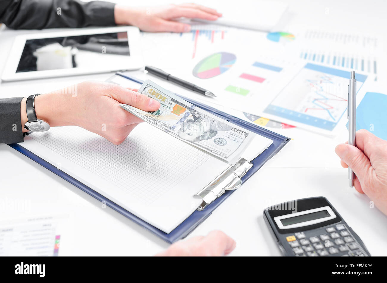 Business people exchanging dollar banknotes Stock Photo - Alamy