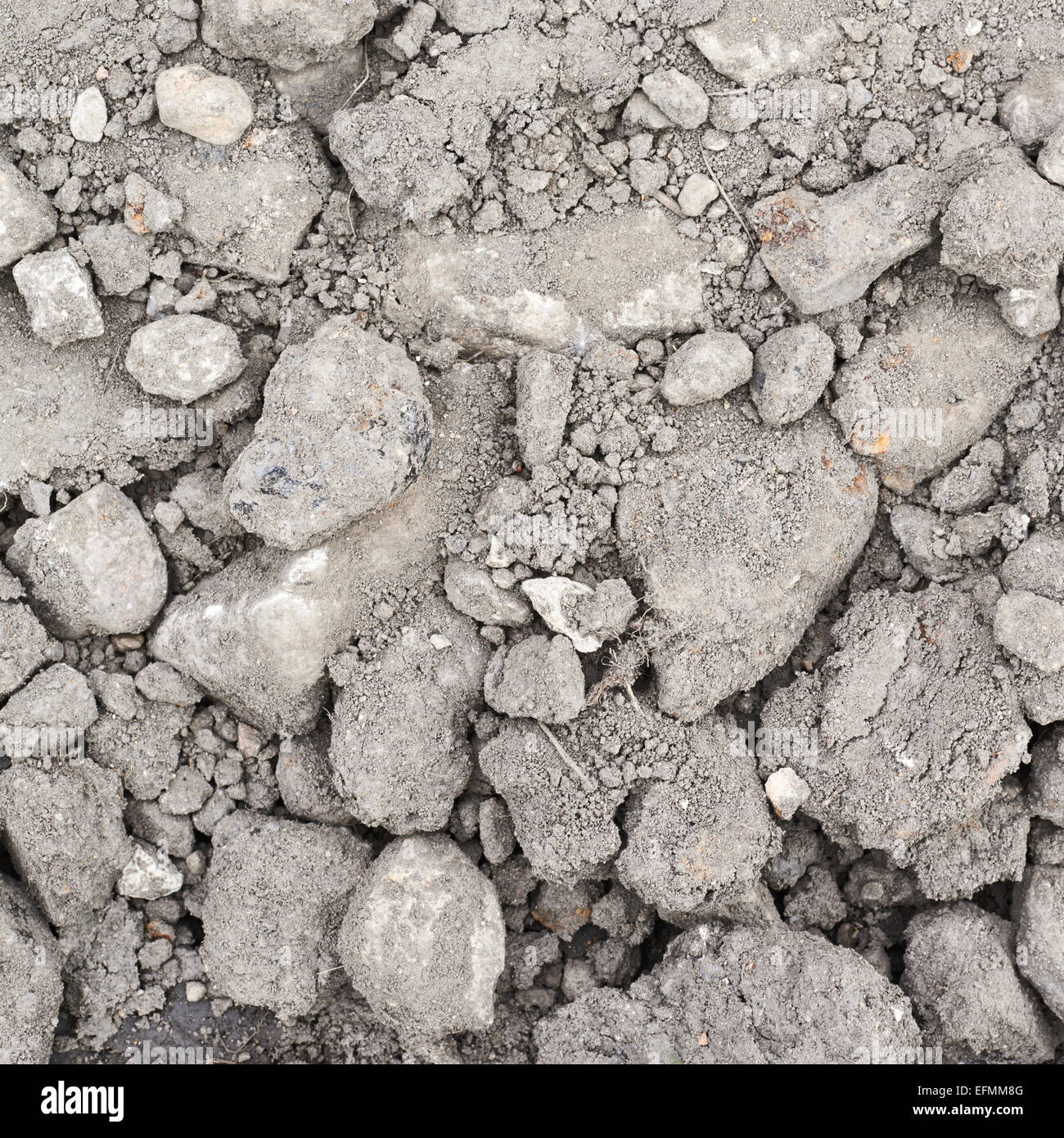 Dried soil covered with stones and dust Stock Photo - Alamy