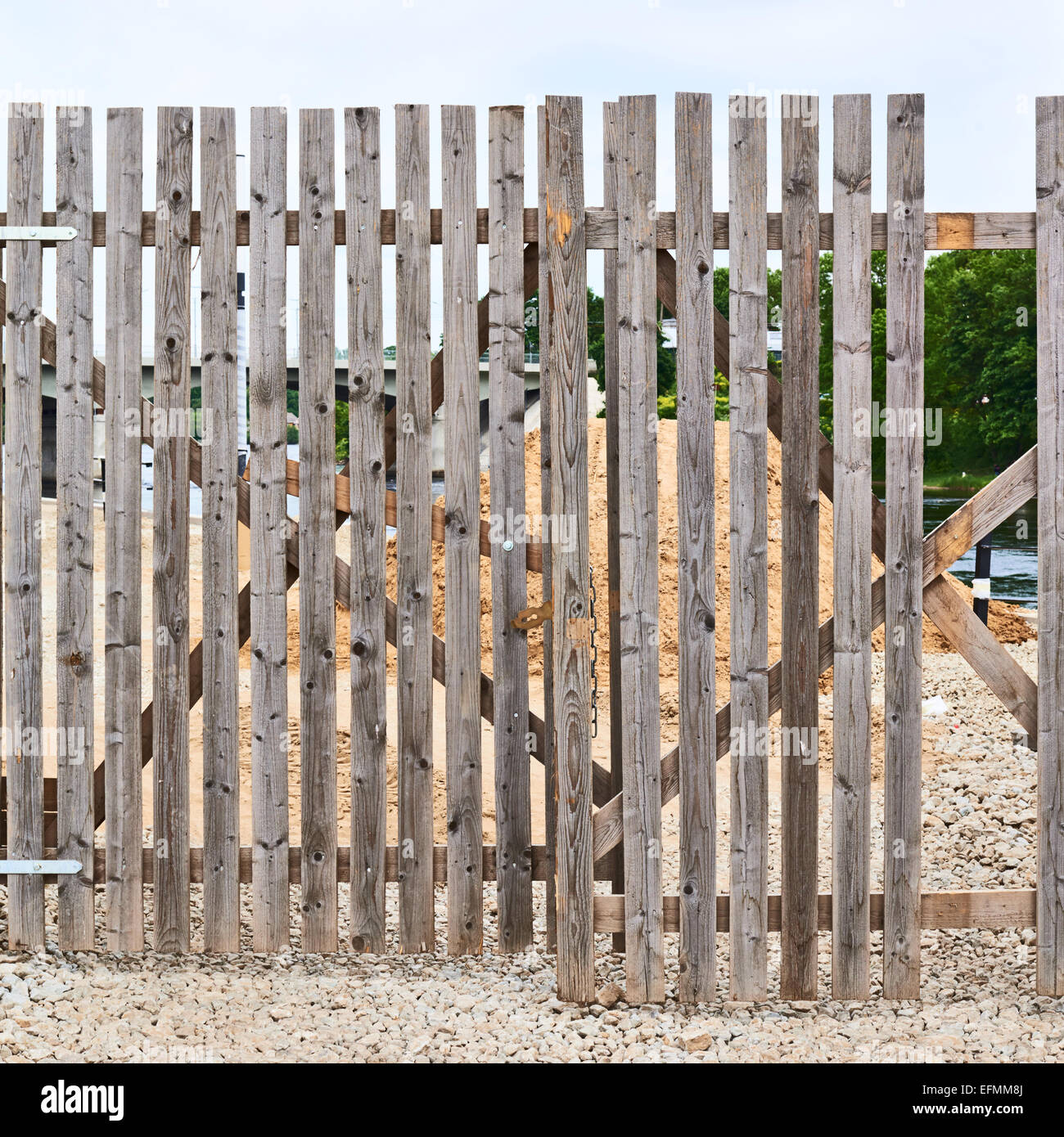 Piles of sand behind the gates Stock Photo - Alamy