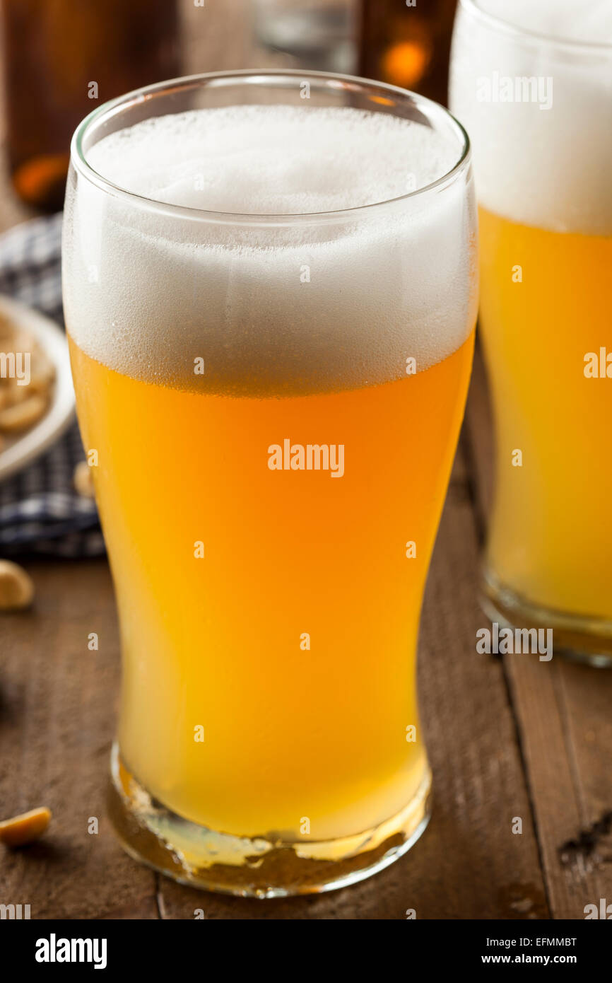 Resfreshing Golden Lager Beer in a Pint Glass Stock Photo - Alamy