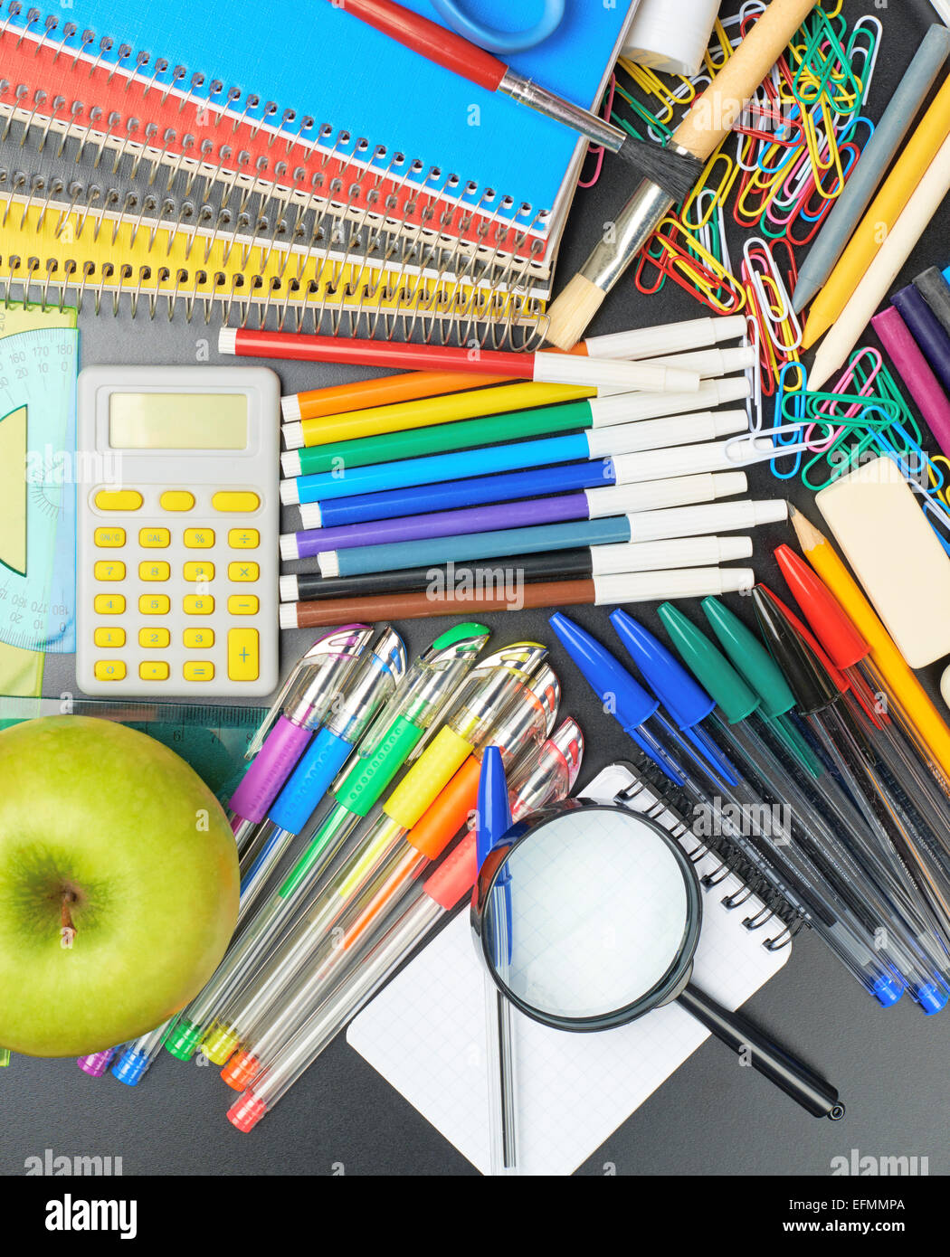 Desk covered with multiple stationery Stock Photo - Alamy