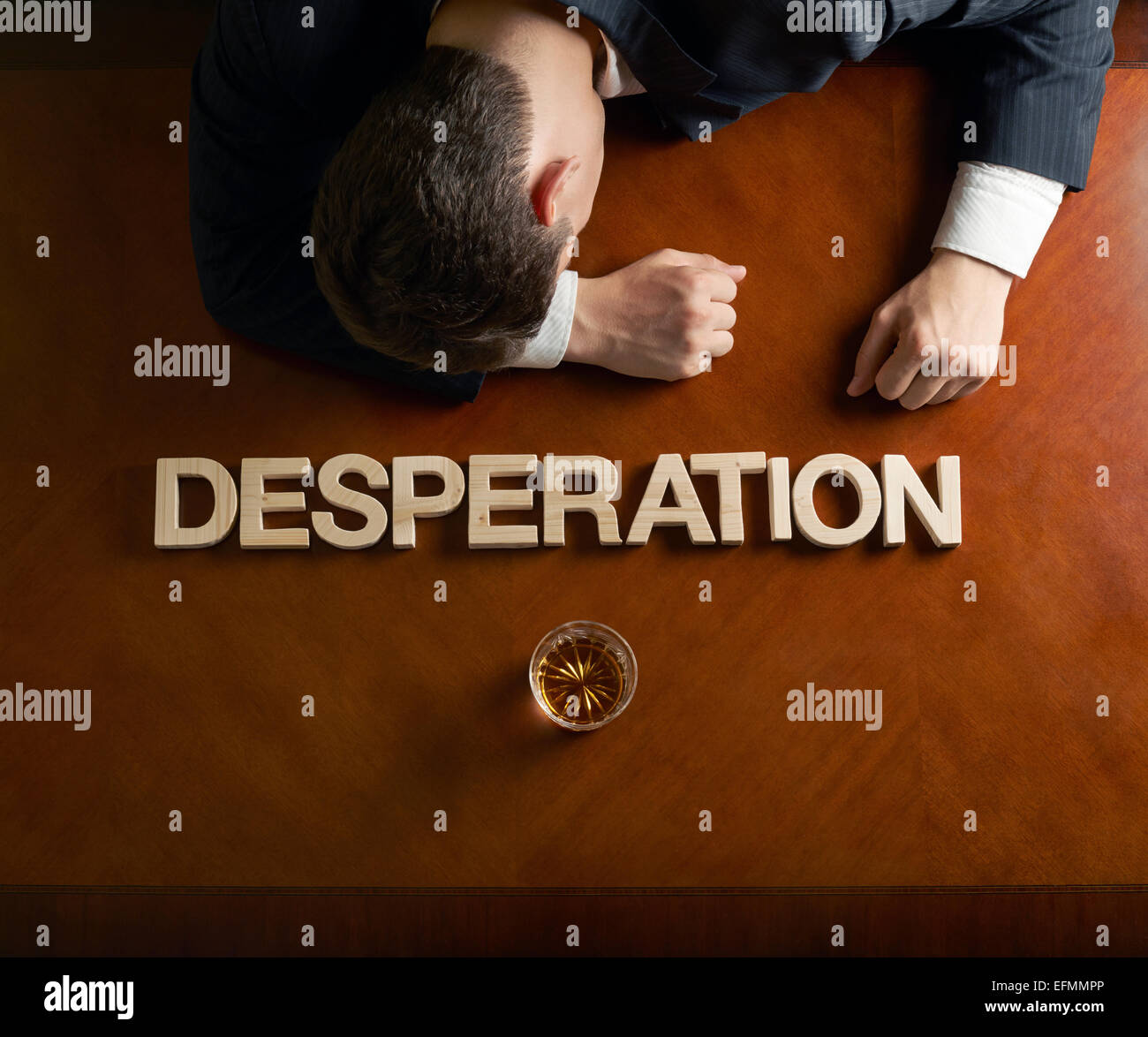 Word Desperation and devastated man composition Stock Photo - Alamy