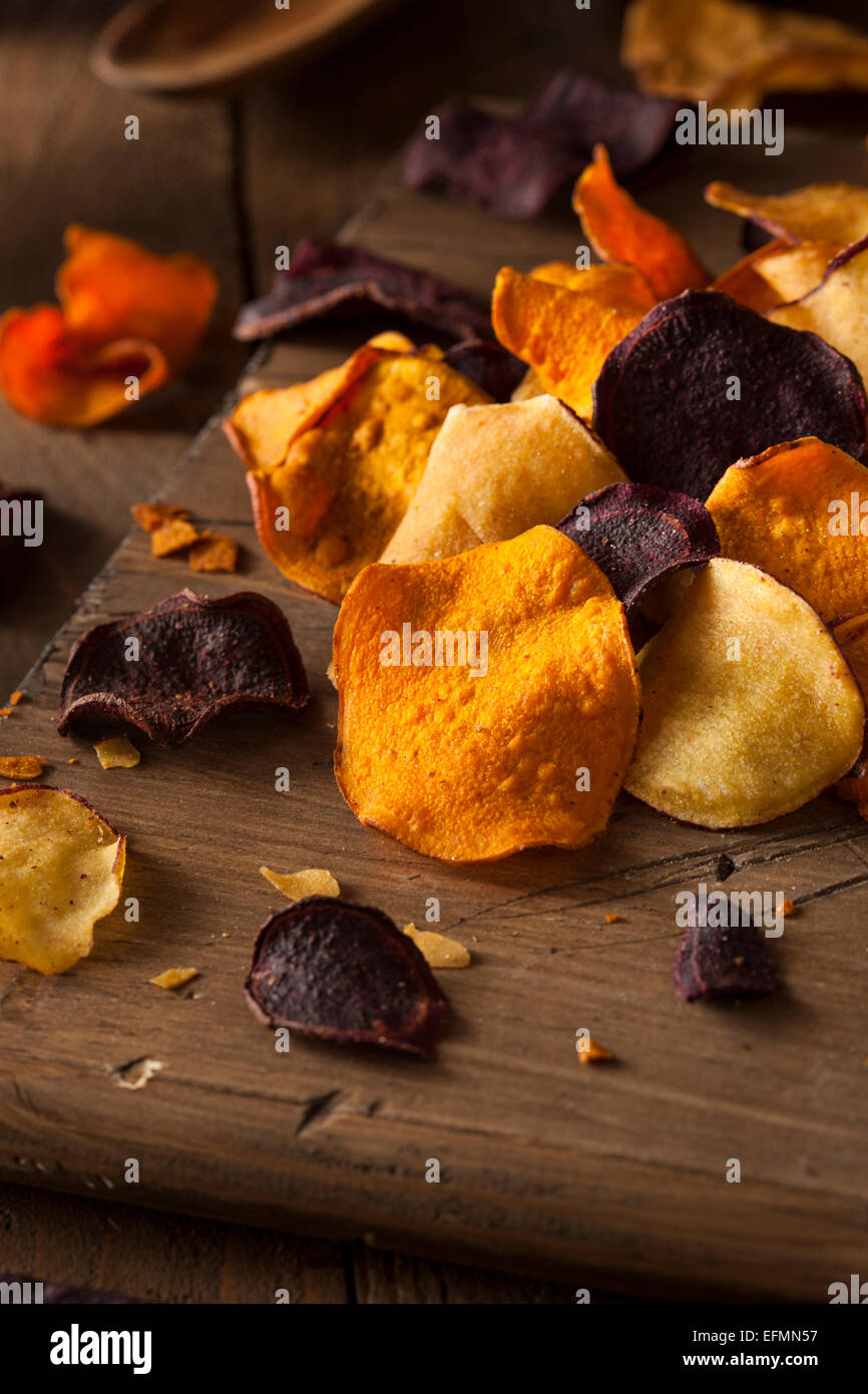 Healthy Homemade Vegetable Chips on a Cutting Board Stock Photo - Alamy